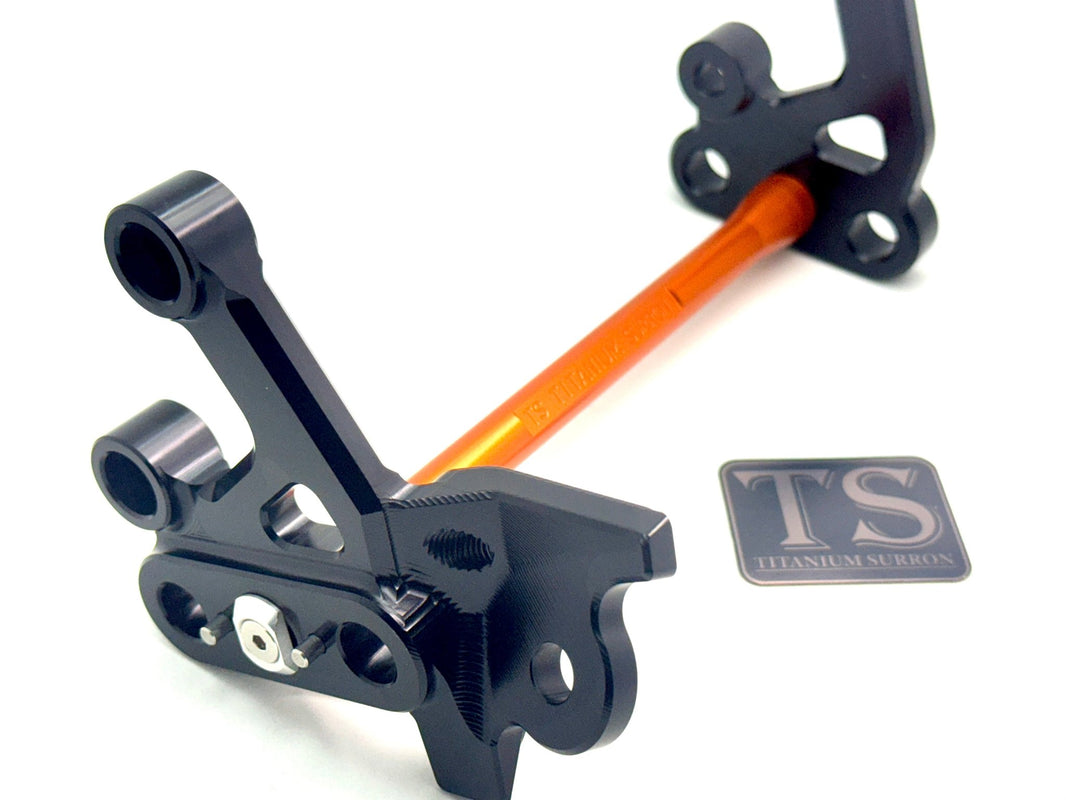 Surron Footpegs and Brackets – Titanium Surron
