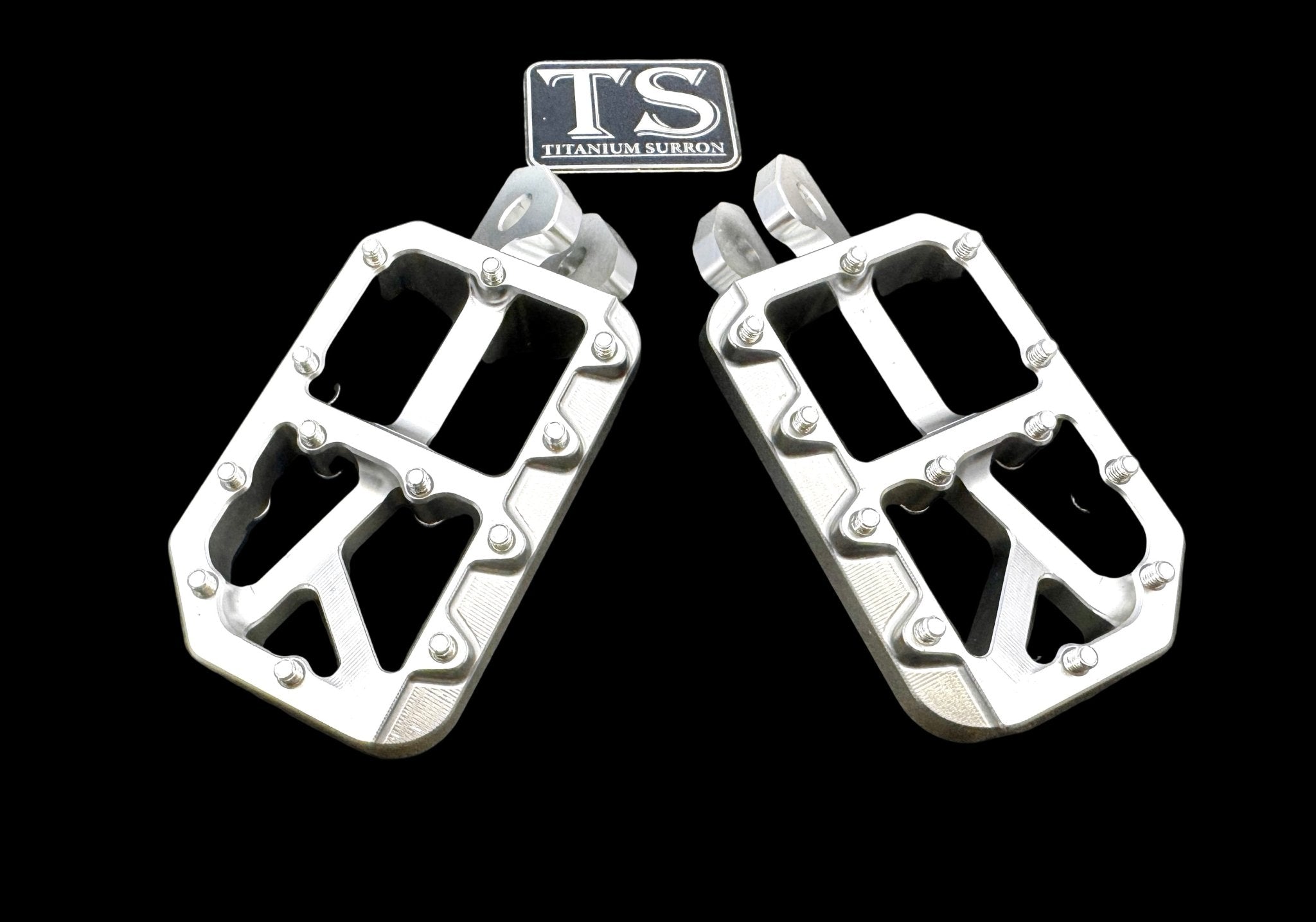 Surron Footpegs and Brackets – Titanium Surron